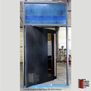 Blackened Steel Pivot Door with Transom & Wood Pulls – In Stock
